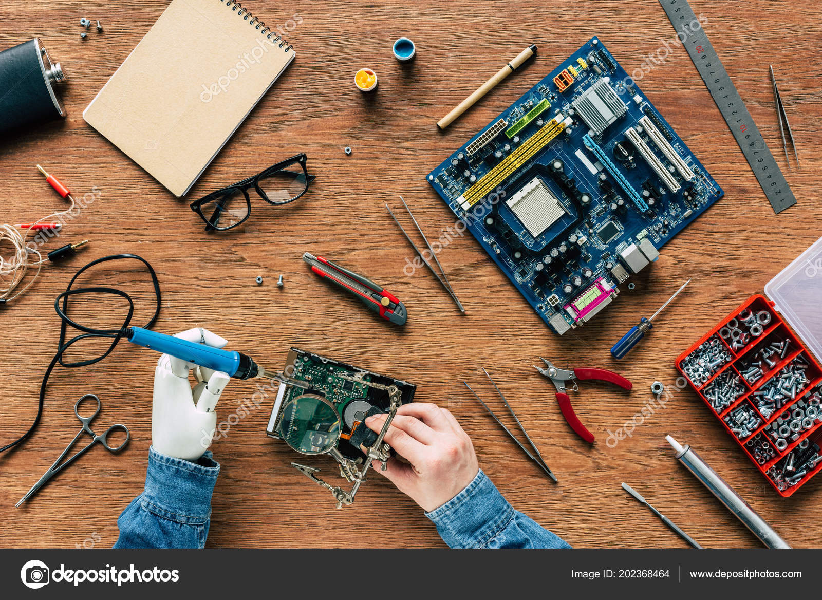 Cropped Image Man Prosthetic Arm Repairing Hard Drive Soldering Iron ...