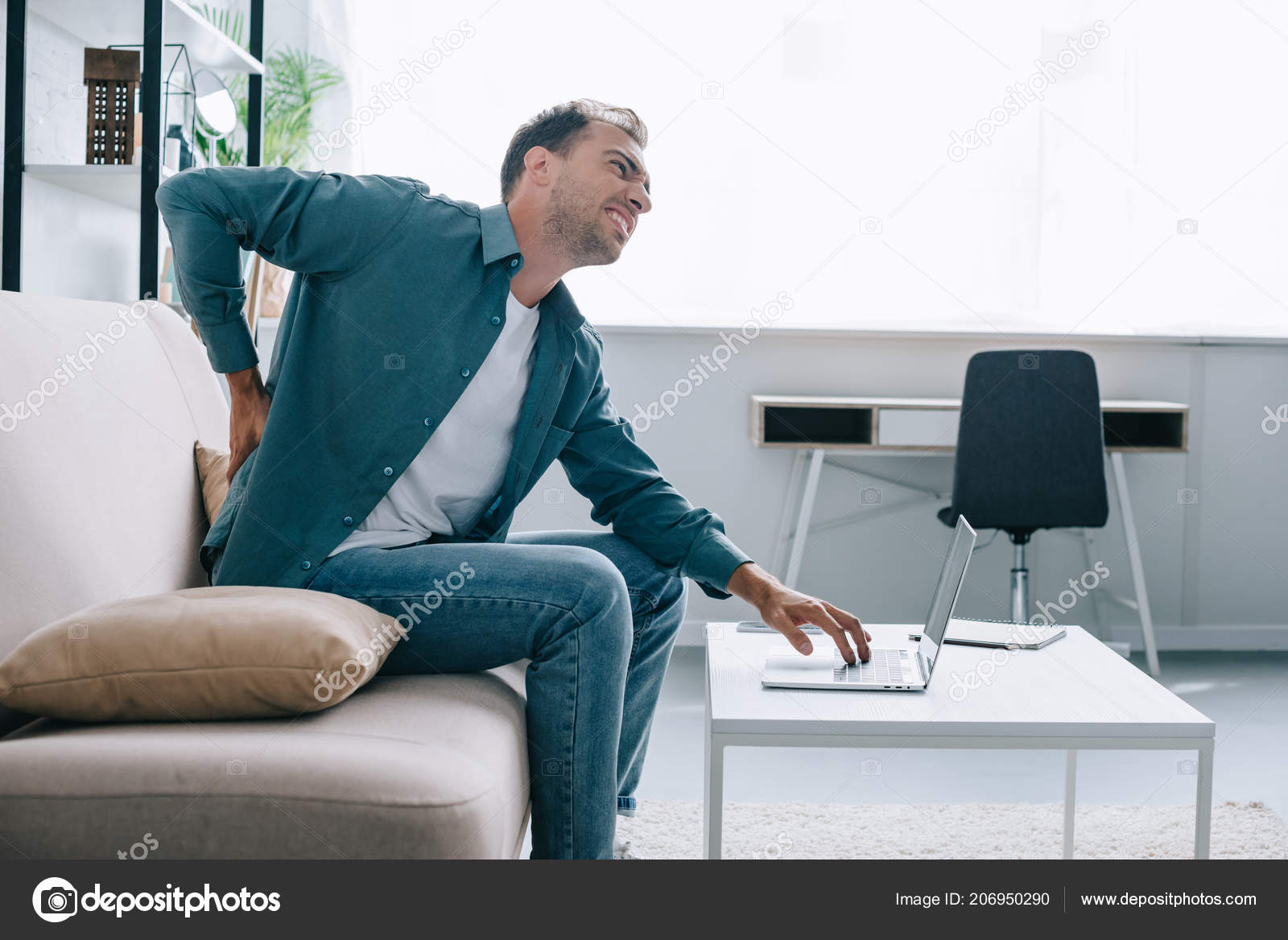Young Man Suffering Back Pain While Using Laptop Home — Stock Photo ...