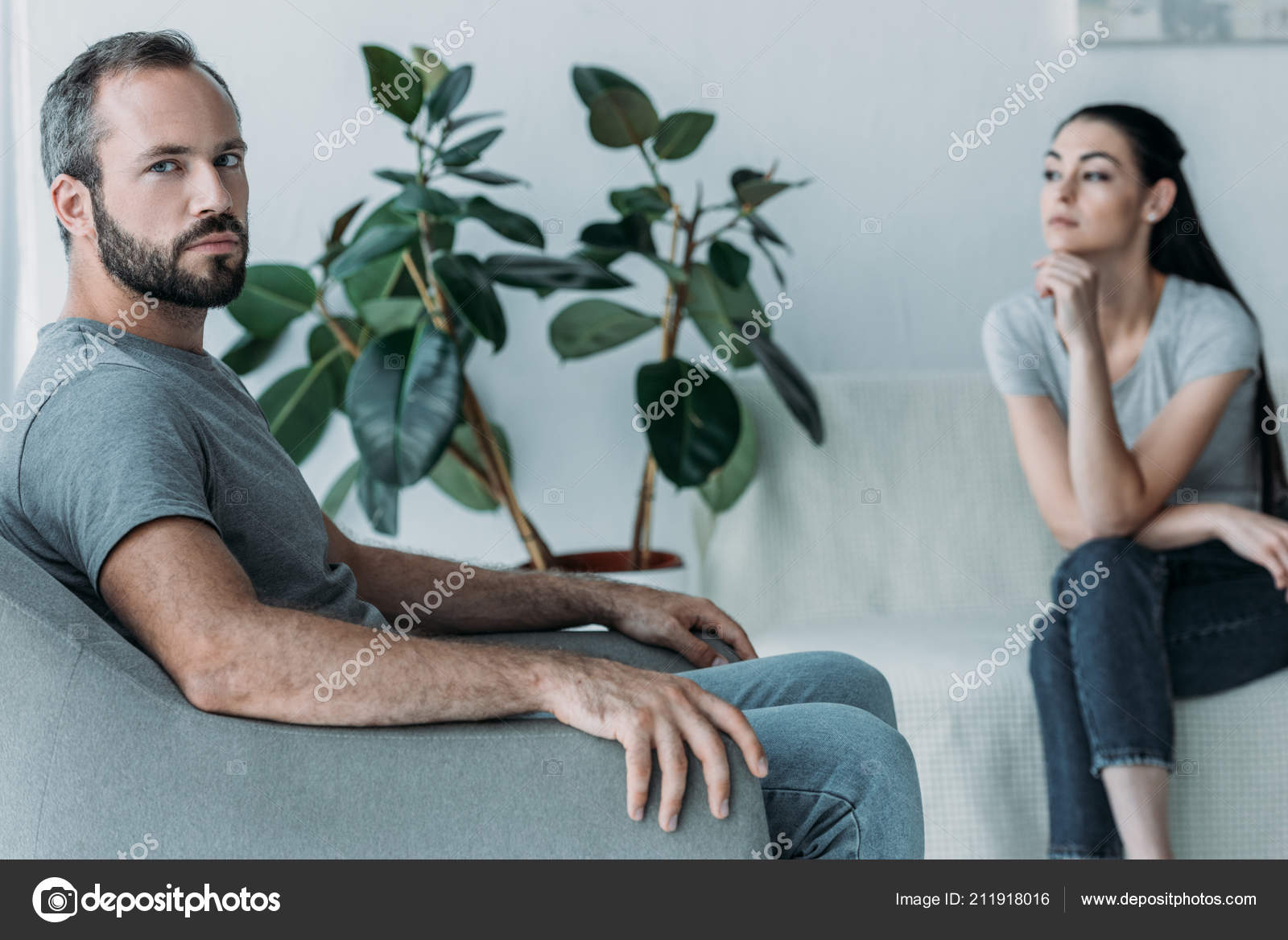 Upset Bearded Man Sitting Armchair Looking Camera While Frustrated ... Upset Bearded Man Sitting Armchair Looking Camera While Frustrated ...