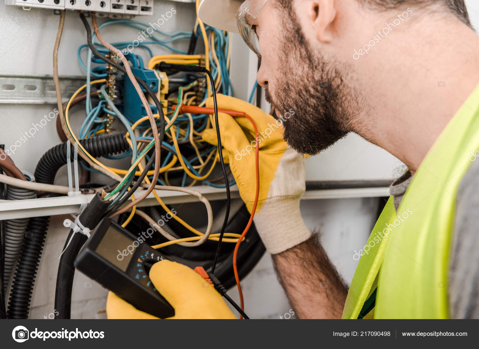 Side View Electrician Checking Electrical Box Multimetr Corridor ...