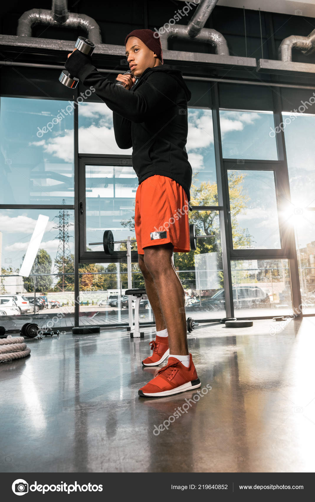 Low Angle View African American Male Boxer Practicing Dumbbells Gym ...