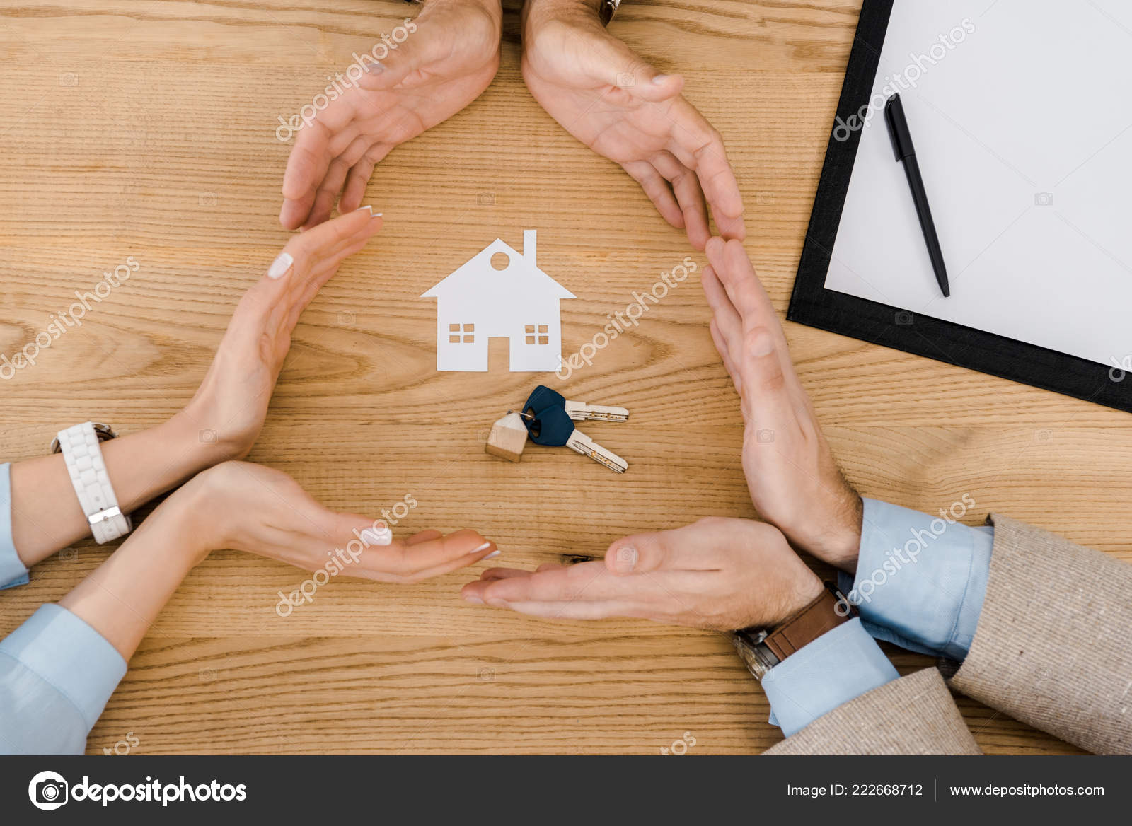 People Making Circle Hands Wooden Table Paper House Keys Stock Photo by ...