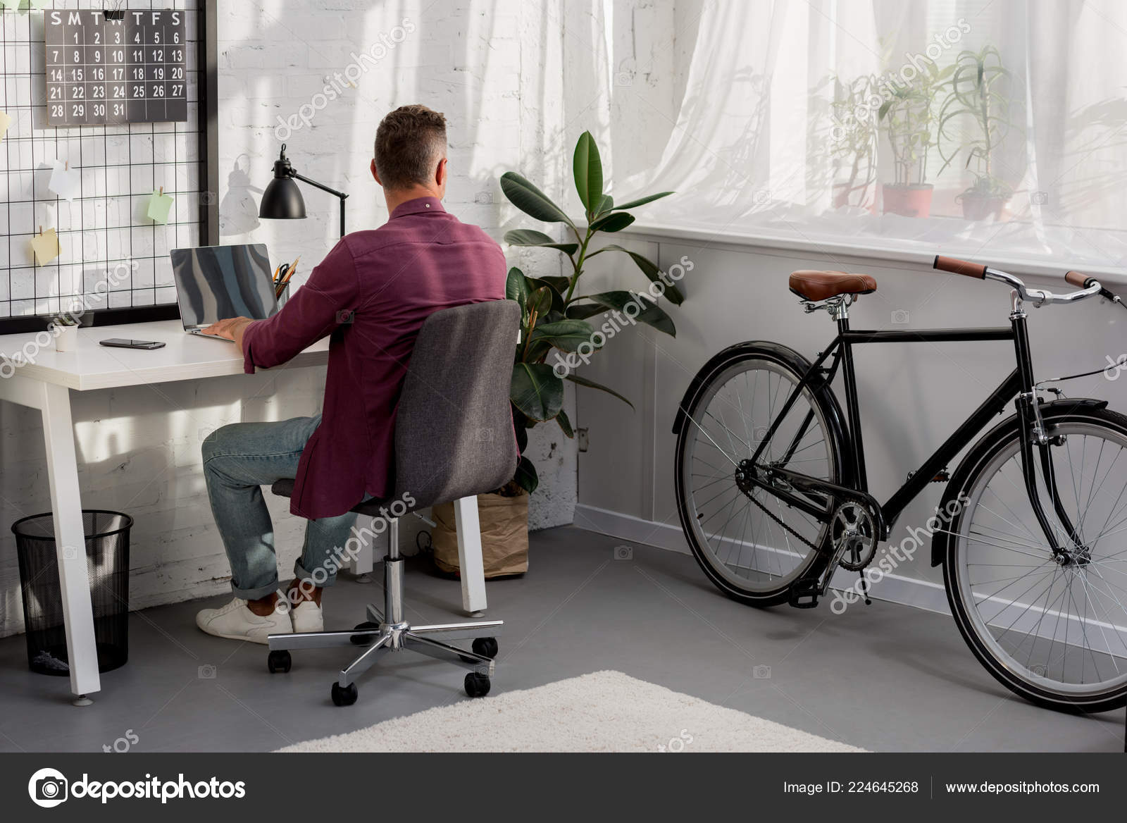 Man Sitting Back View