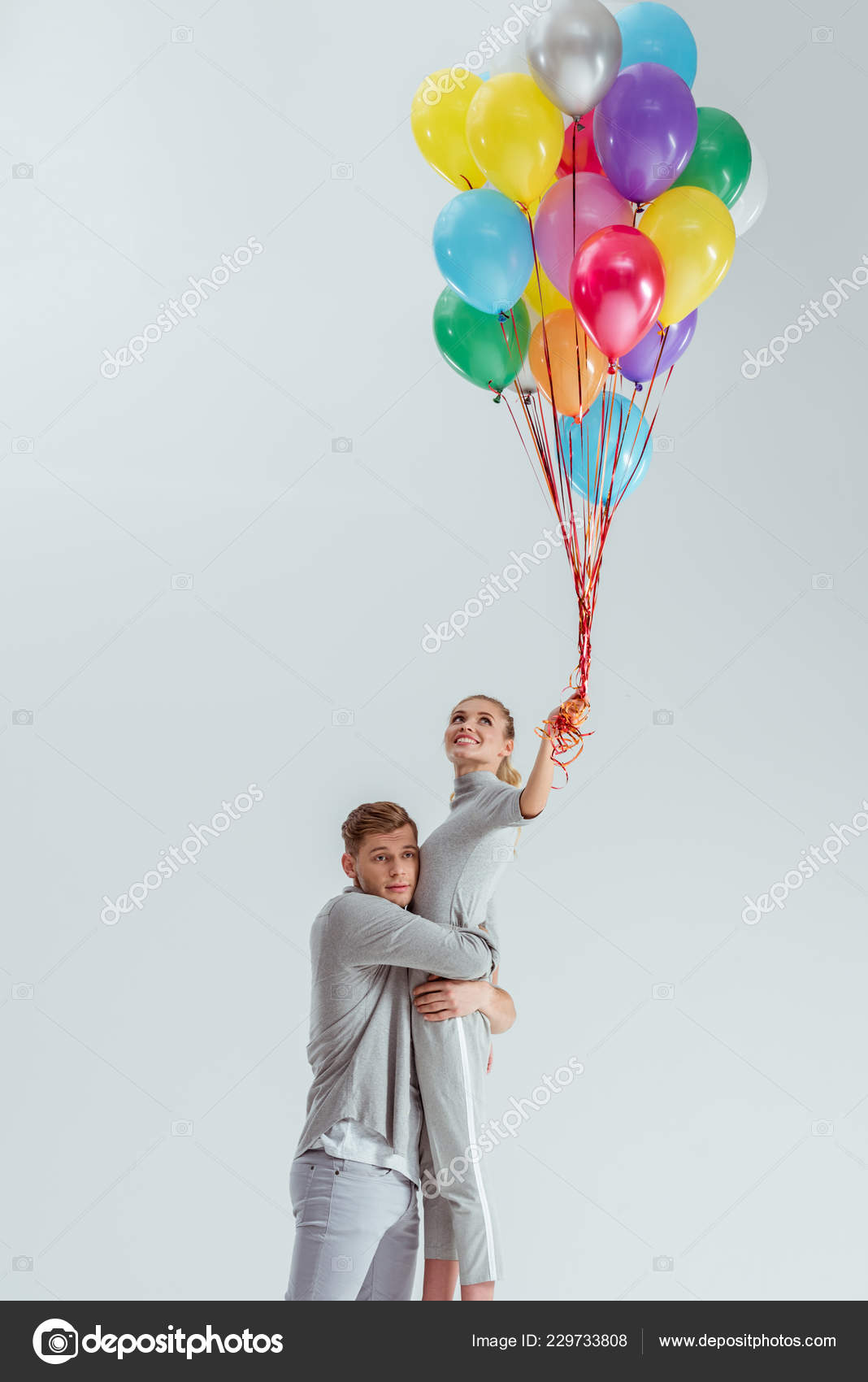 Beautiful Couple Hugging While Woman Holding Bundle Colorful Balloons ...