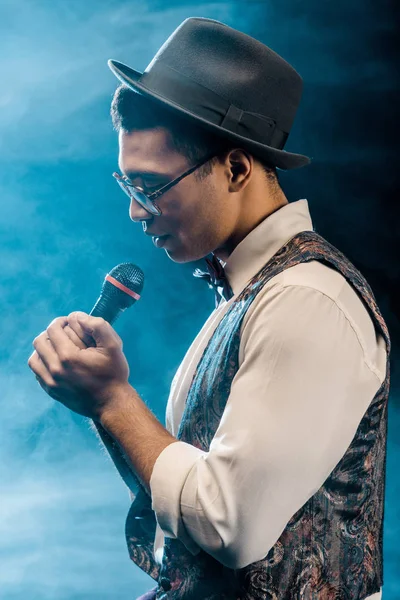 Side View Mixed Race Male Musician Hat Singing Microphone Isolated ...