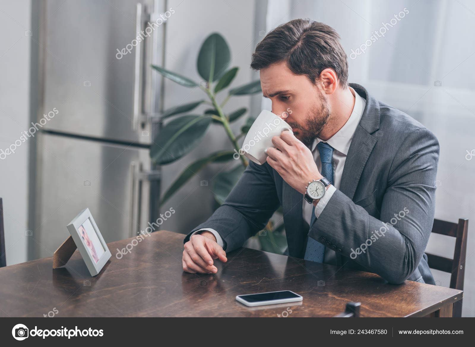 Sad Man Gray Suit Sitting Wooden Table Smartphone Drinking Looking ...