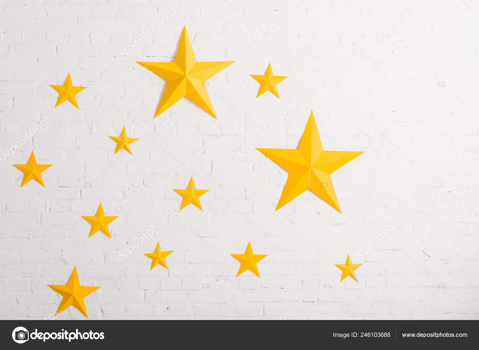 Yellow Cardboard Stars Light Textured Background Stock Photo by ...