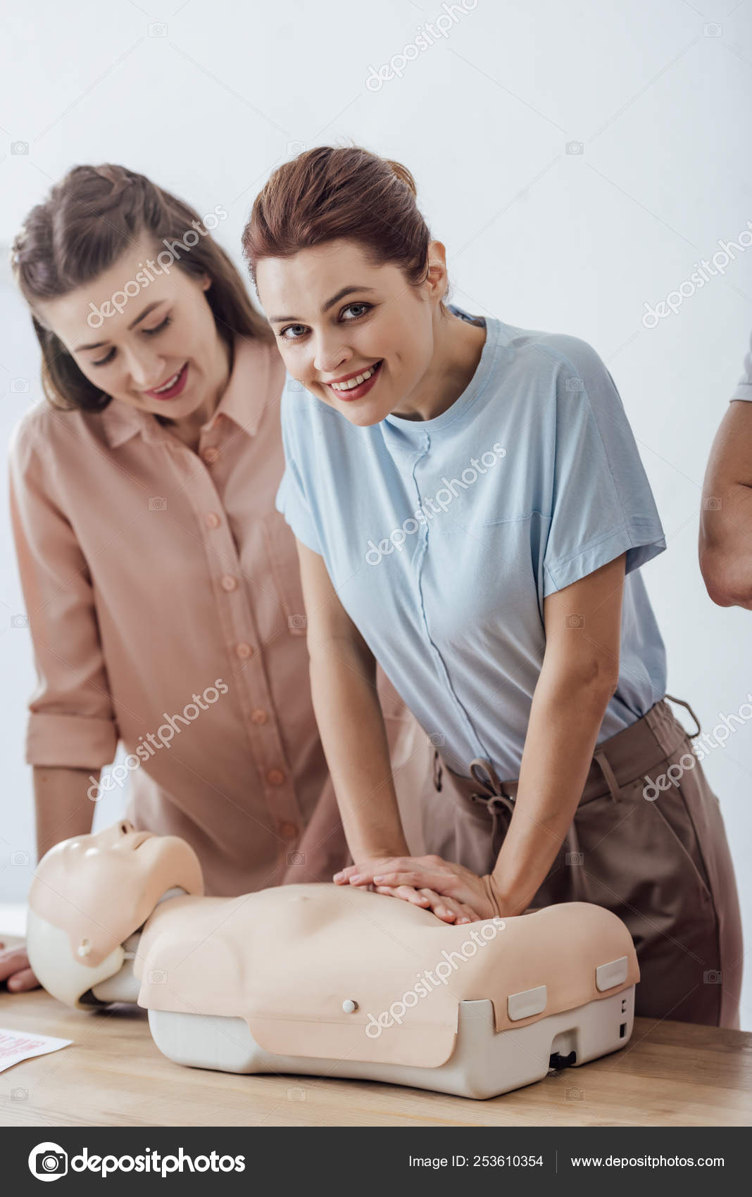 Smiling Woman Performing Chest Compression Dummy Looking Camera Cpr ...