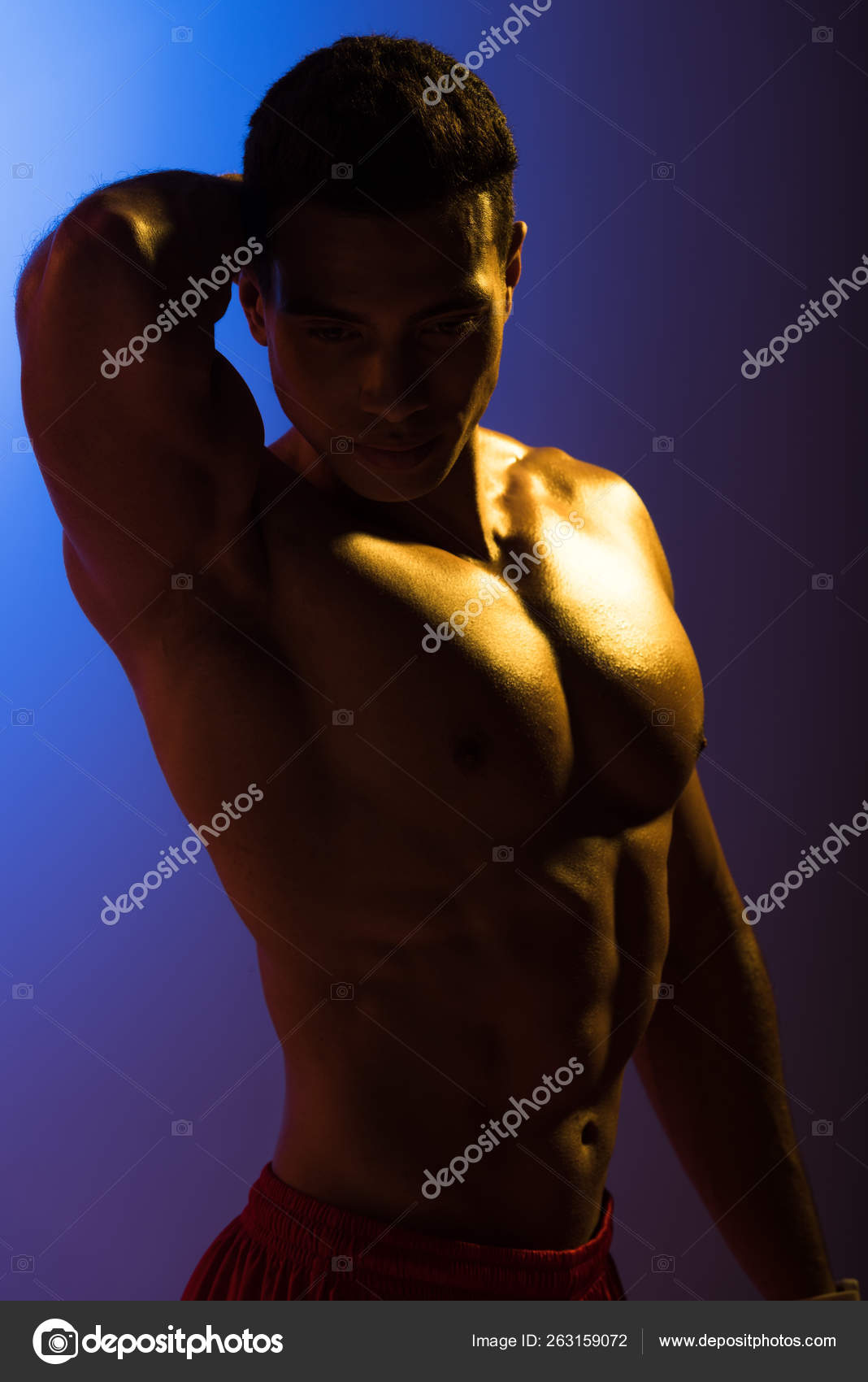 Good Looking Mixed Race Man Muscular Torso Posing Camera Blue — Stock ...