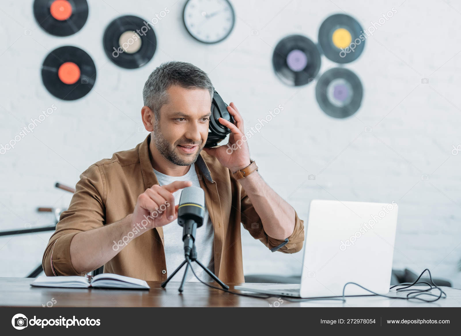 Handsome Radio Host Holding Adjusting Headphones Microphone ...