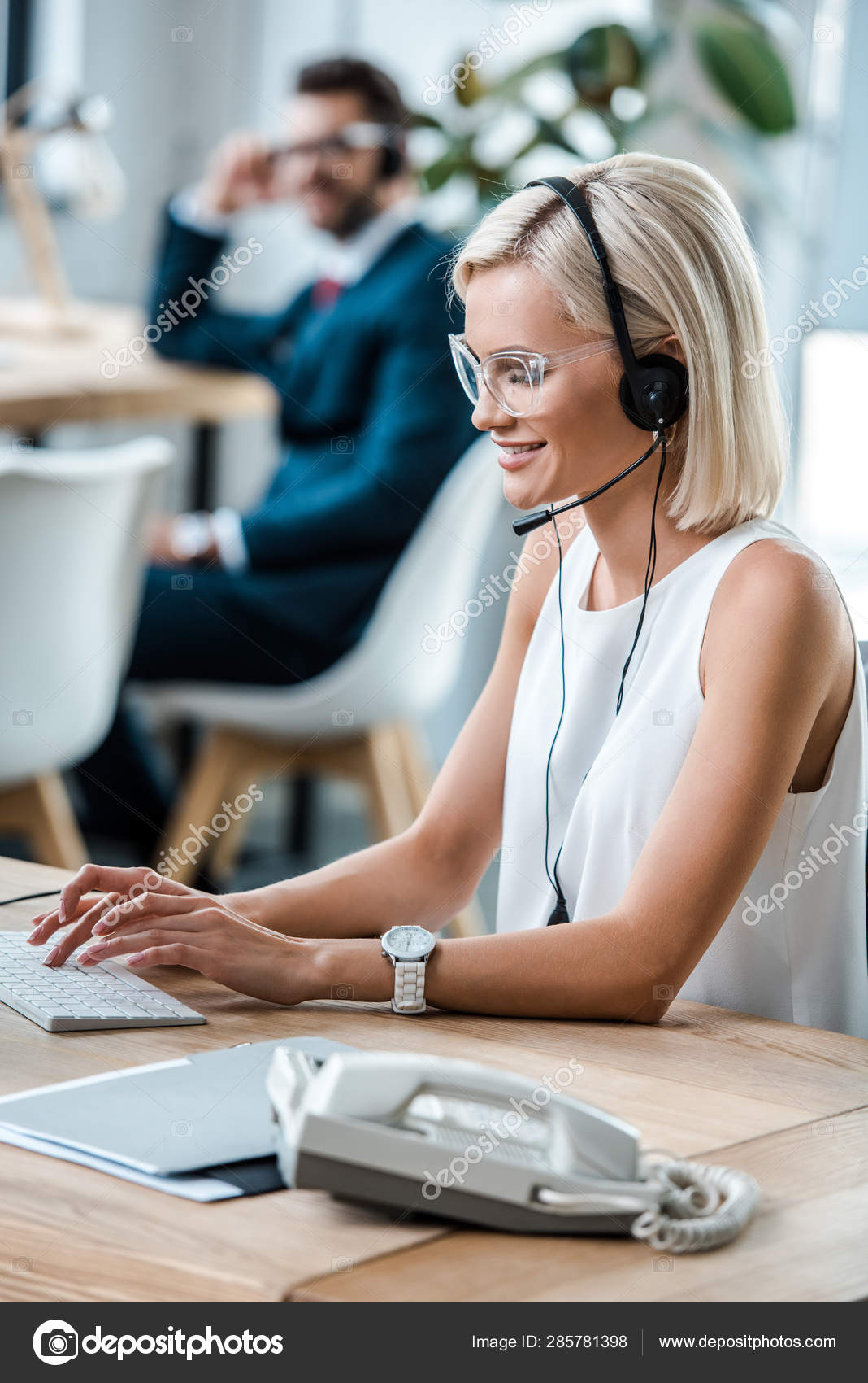 Selective Focus Cheerful Operator Typing Computer Keyboard Coworker ...
