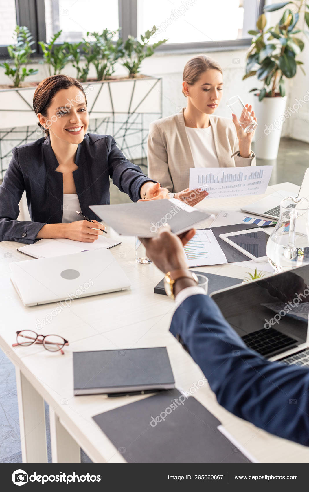 Partial View Multiethnic Businesspeople Formal Wear Table Conference ... Partial View Multiethnic Businesspeople Formal Wear Table Conference ...