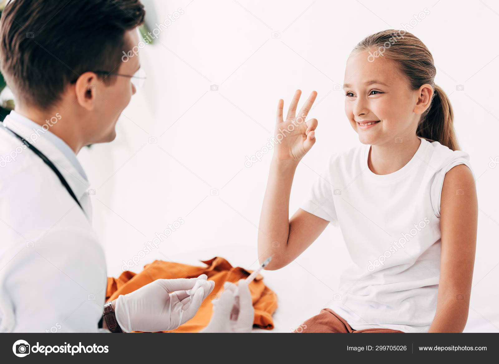 Pediatrist Holding Syringe Smiling Child Showing Okay Sign Stock Photo ... Pediatrist Holding Syringe Smiling Child Showing Okay Sign Stock Photo ...