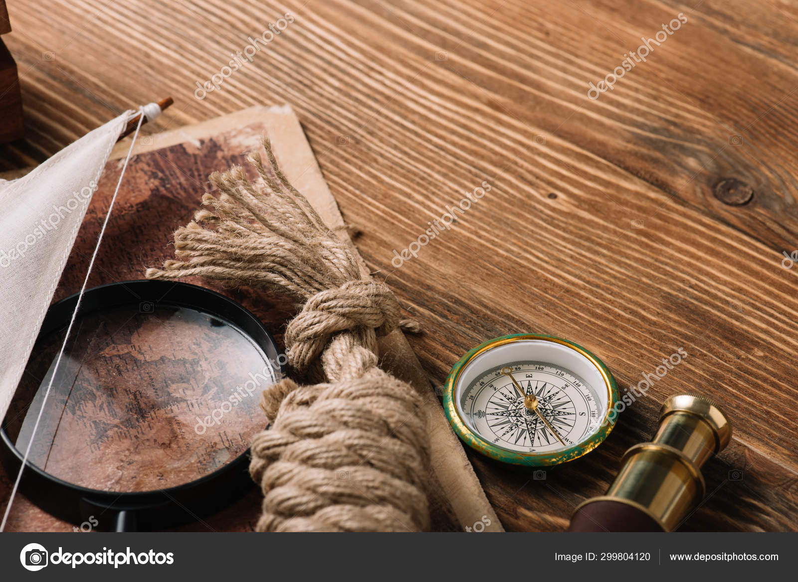 World Map Rope Cable Compass Magnifying Glass Wooden Surface Stock ...