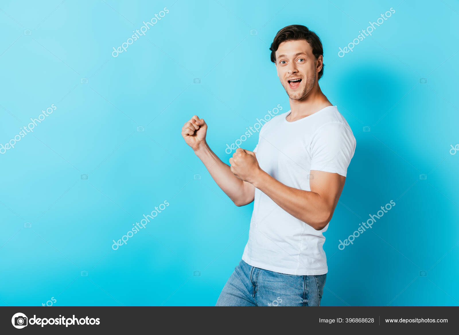 Man Looking Camera While Showing Yes Gesture Blue Background Stock ...
