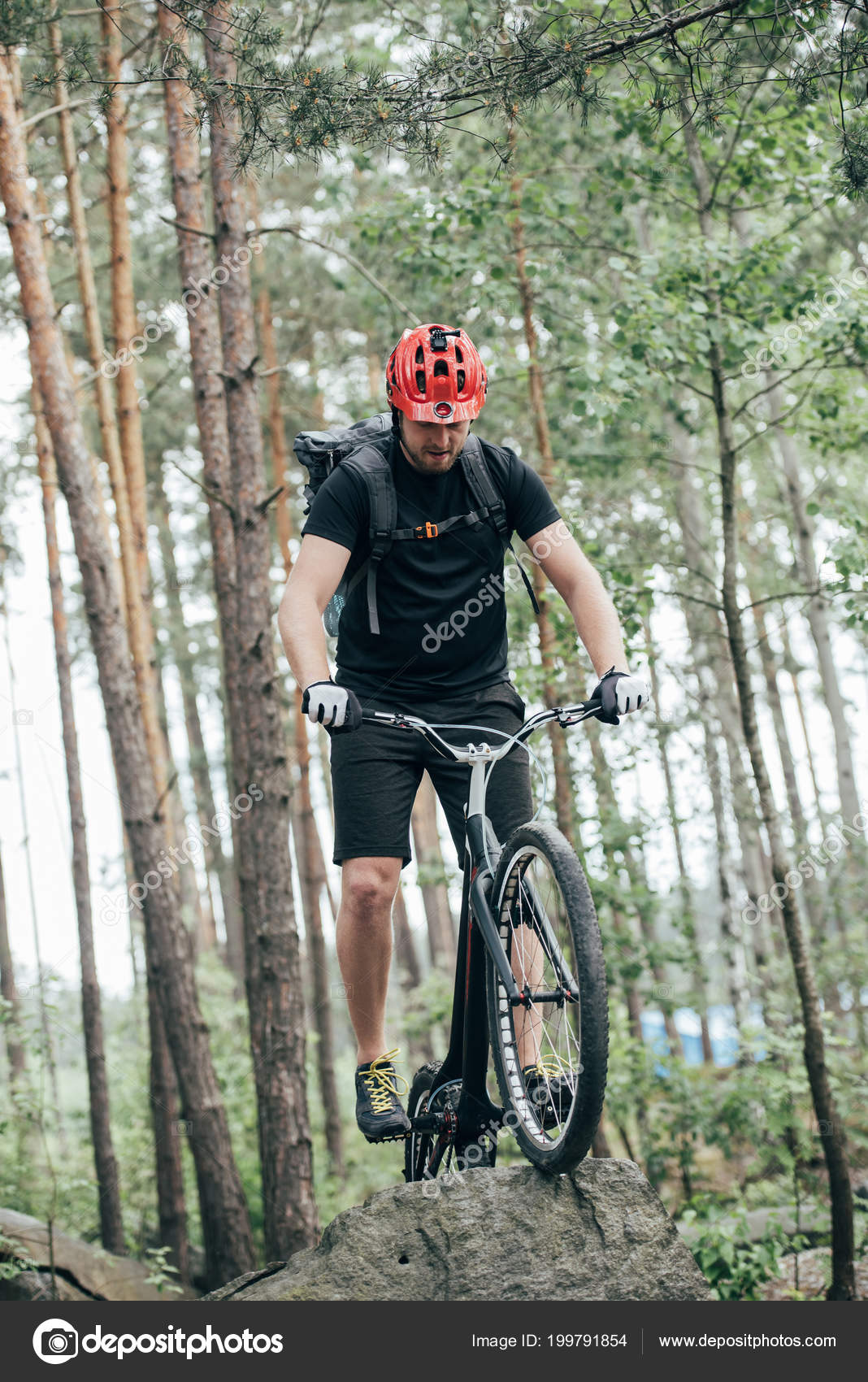 Front View Male Extreme Cyclist Protective Helmet Doing Stunt Mountain ...