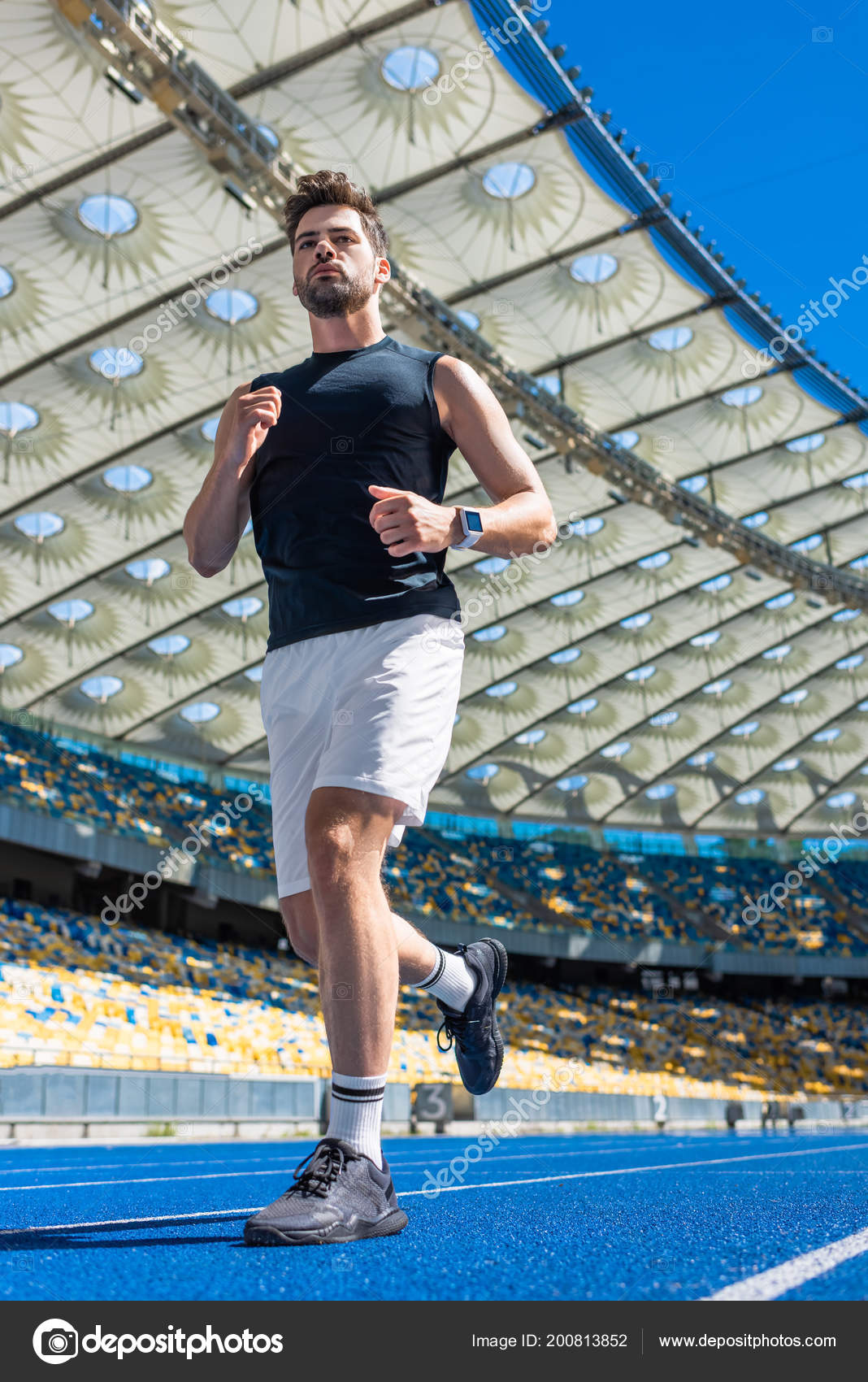 Bottom View Sporty Young Man Exercising Running Track Sports Stadium ...