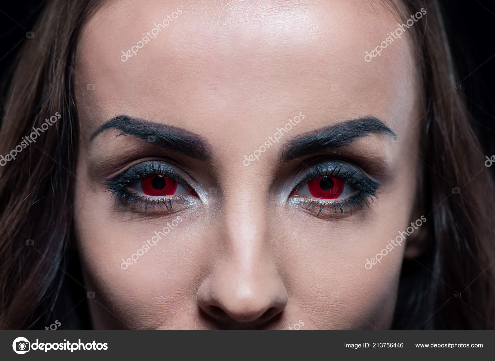 Cropped View Demon Red Eyes Stock Photo by ©VitalikRadko 213756446