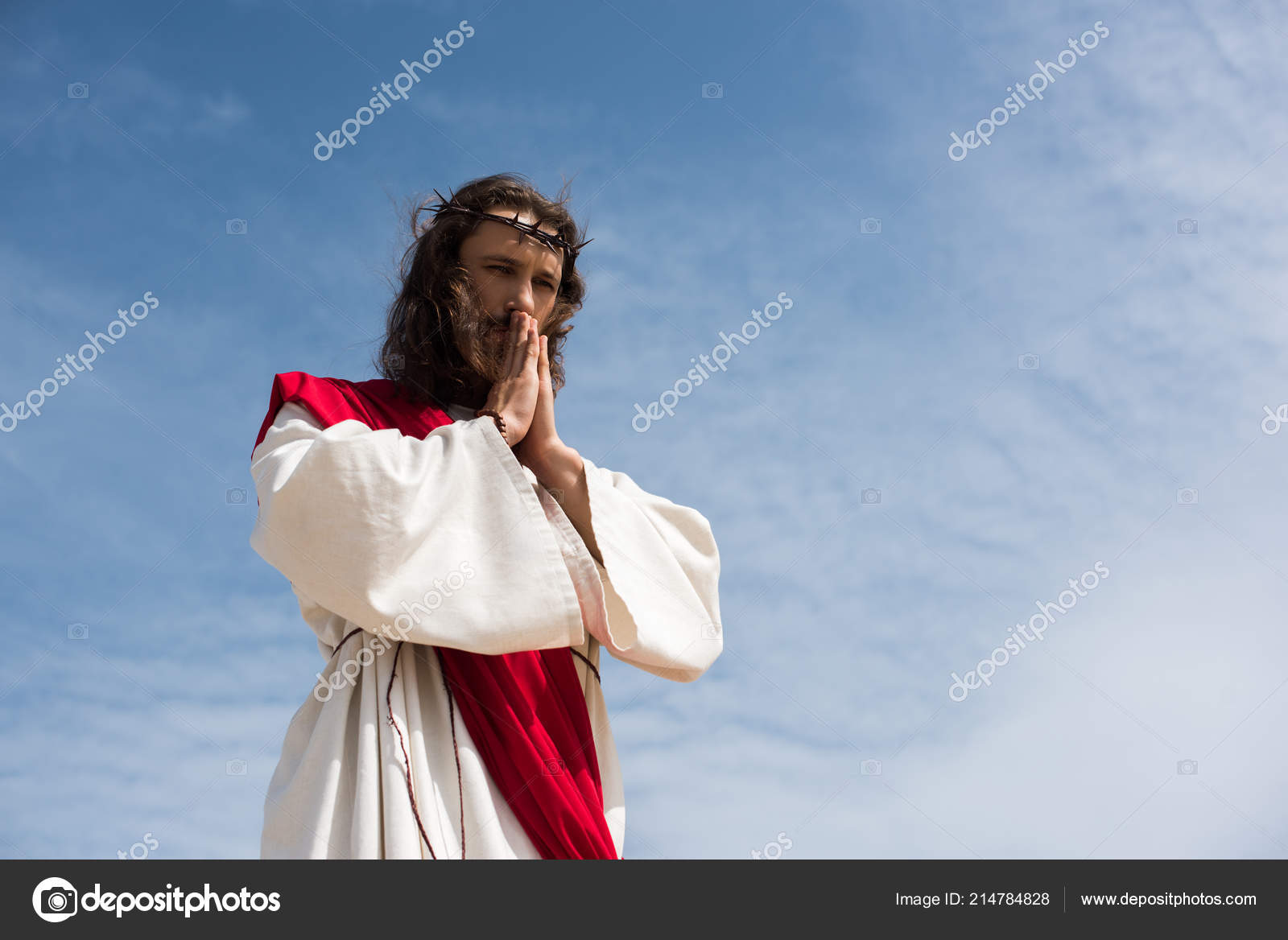 Low Angle View Jesus Robe Red Sash Praying Blue Sky — Stock Photo ...