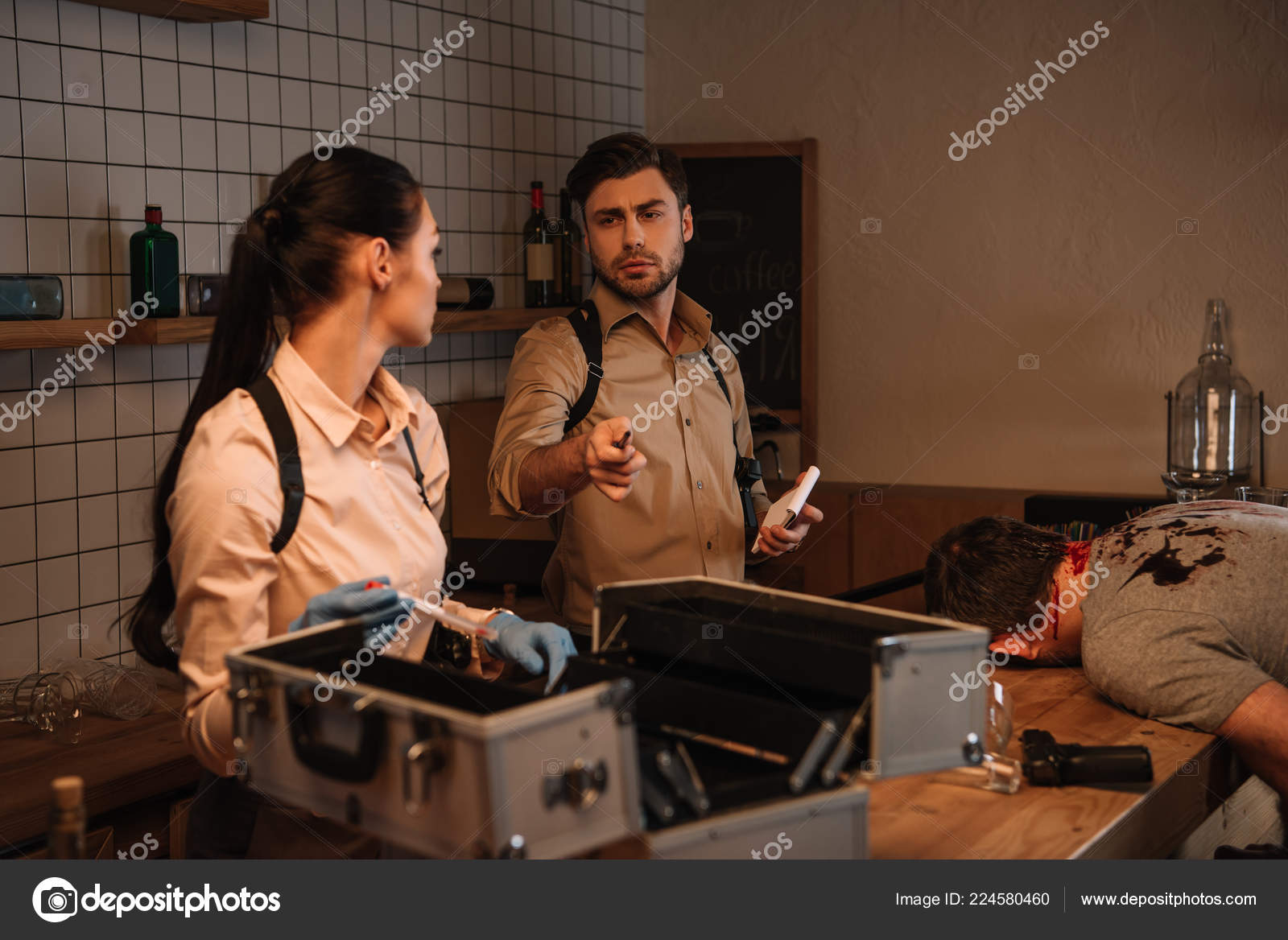 Focused Female Male Detectives Using Evidence Collection Kit