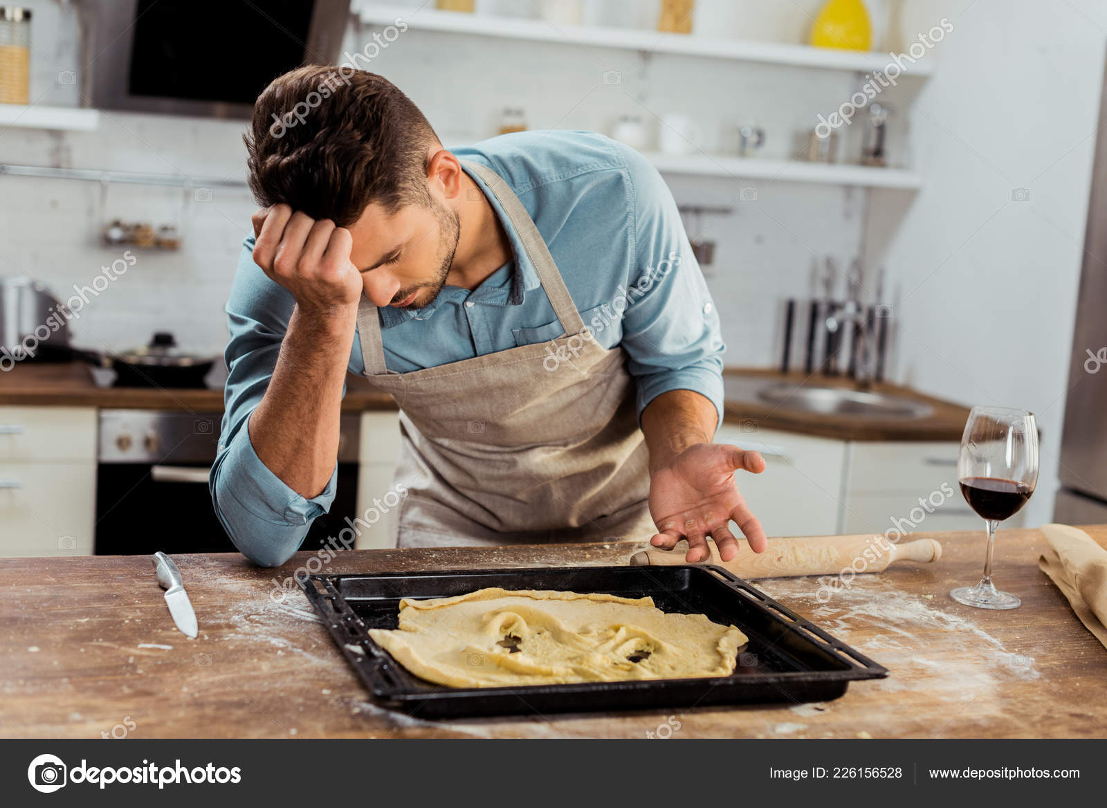 Upset Young Man Apron Leaning Table Spoiled Dough Baking Tray — Stock ...
