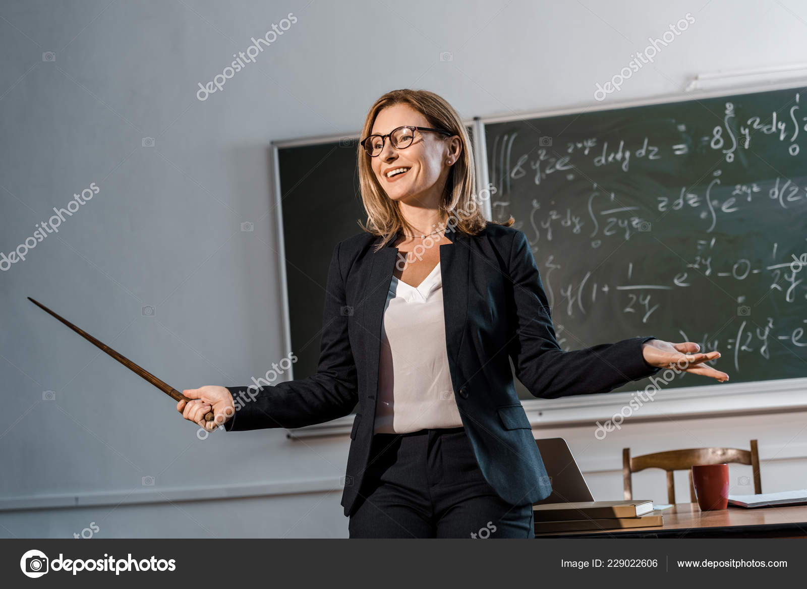 Smiling Female Teacher Wooden Pointer Explaining Mathematical Equations ...