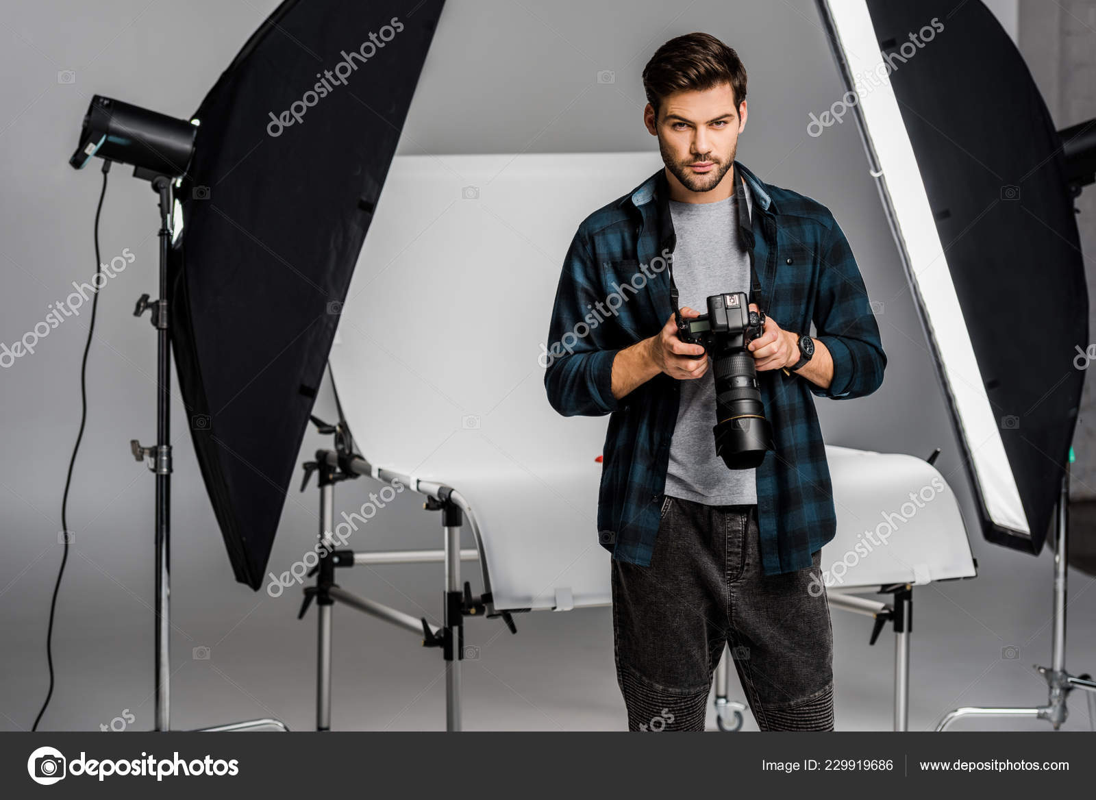 Handsome Professional Young Photographer Using Camera Photo Studio ...