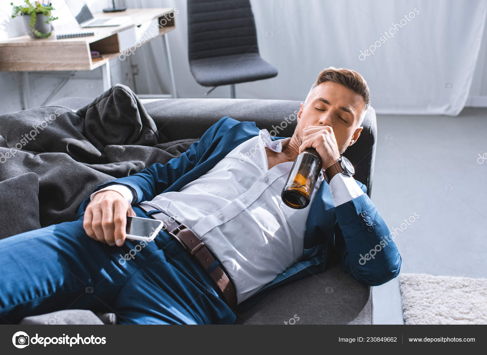 Depressed Businessman Drinking Alcohol Bottle Lying Sofa Living Room ...