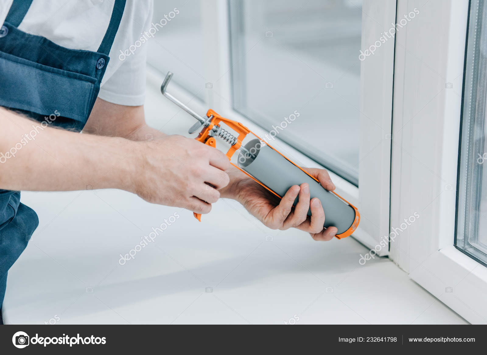 Cropped Image Male Repairman Fixing Window Sealant Gun Stock Photo by ...