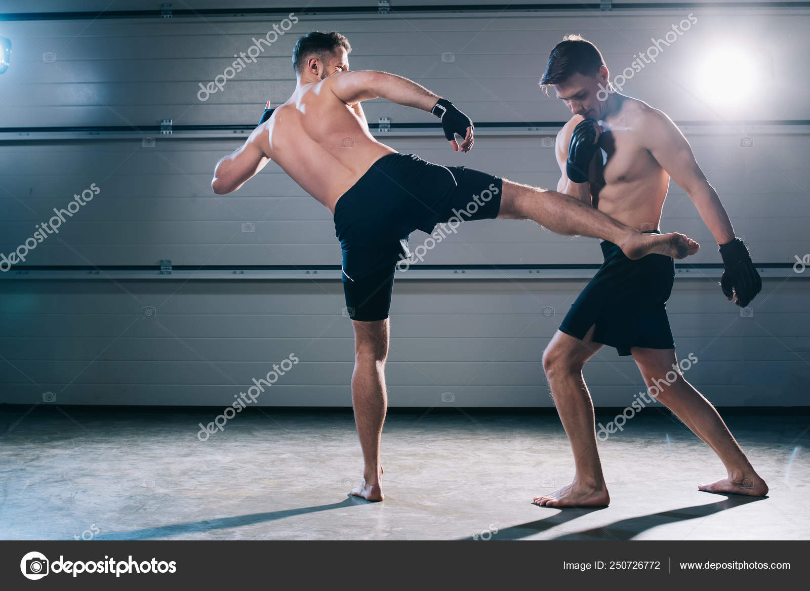 Back View Barefoot Mma Fighter Kicking Opponent Leg Stock Photo by ...