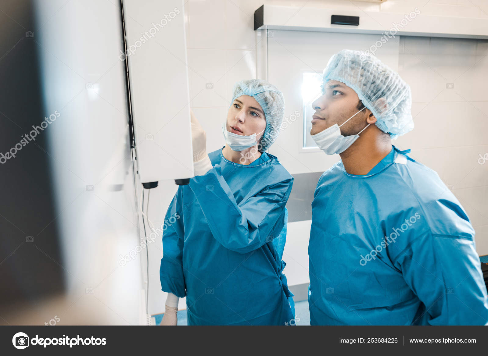 Good Looking Beautiful Doctors Uniforms Medical Masks Looking Screen ...