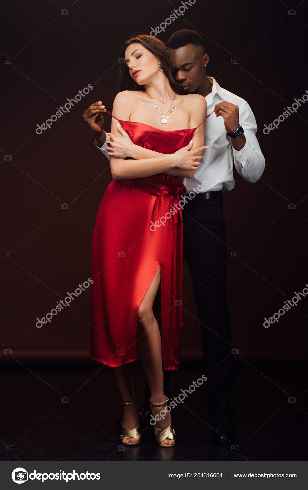 African American Man Undressing Beautiful Woman Red Dress Isolated