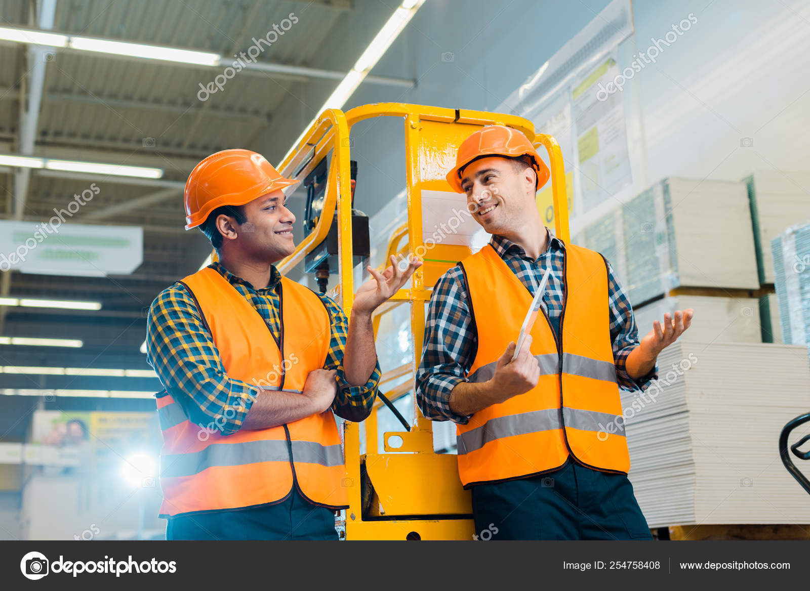 Cheerful Multicultural Workers Talking Gesturing While Standing Scissor ...