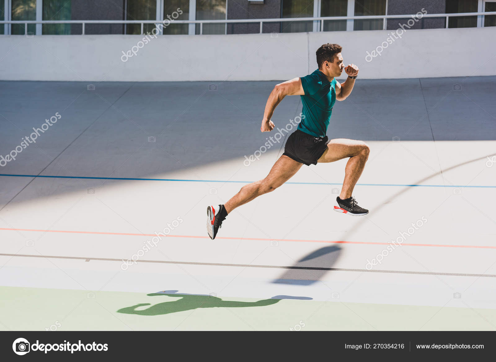 Side View Mixed Race Sportsman Sprint Running Stadium Stock Photo by ...
