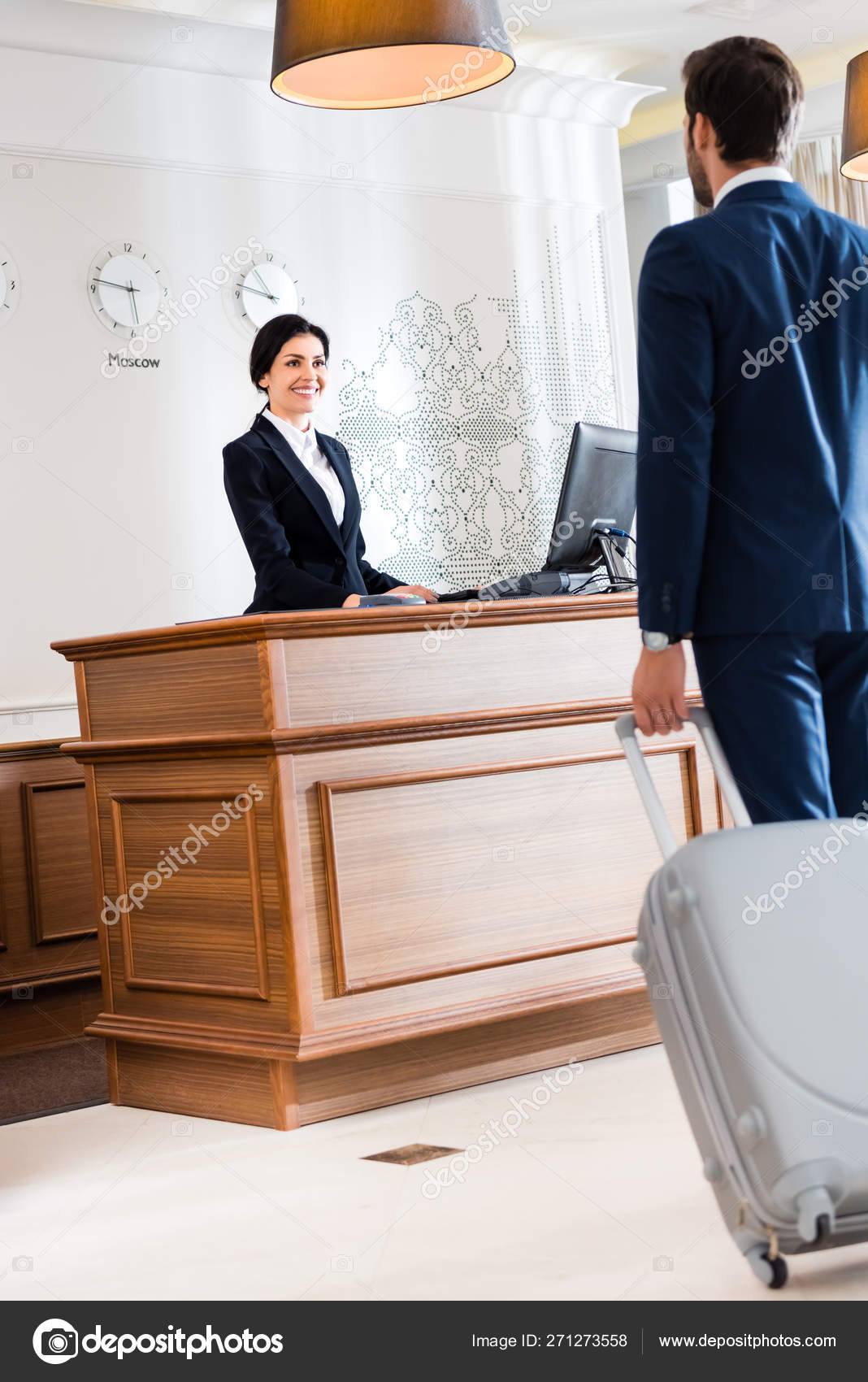 Selective Focus Attractive Receptionist Looking Businessman Walking ...