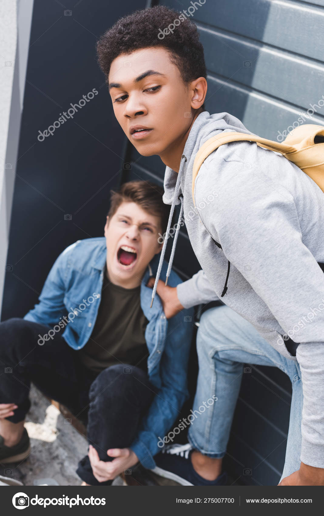 Selective Focus African American Boy Hoodie Jeans Bulling Screaming ...
