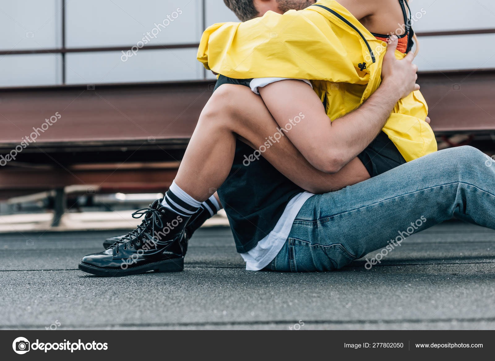 Woman Sitting On Man