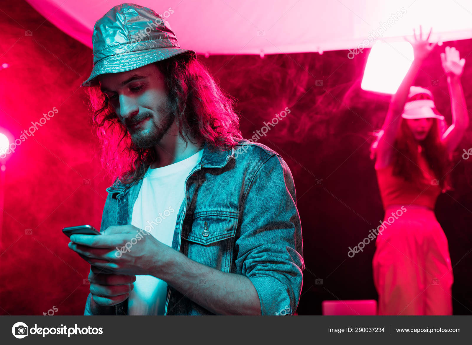 Man Using Smartphone Rave Party Nightclub — Stock Photo © VitalikRadko ...