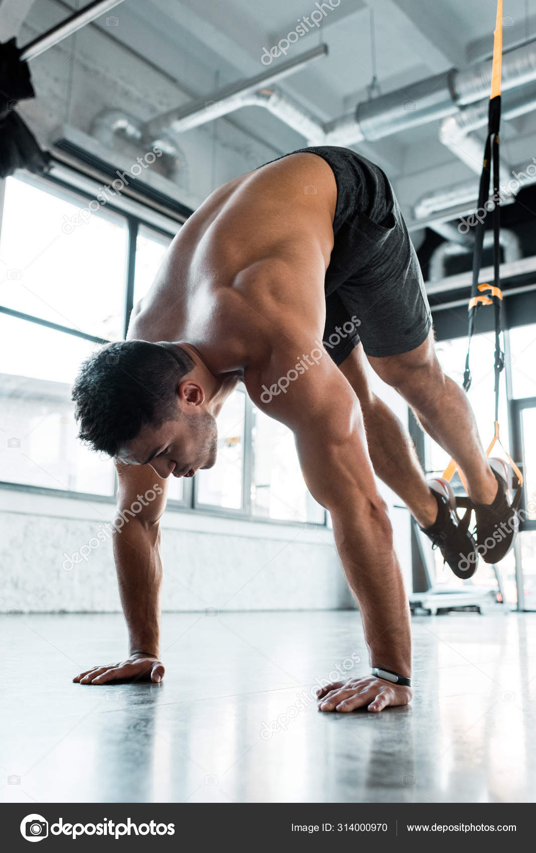 Handsome Sportsman Working Out Suspension Trainer Sports Center Stock ...