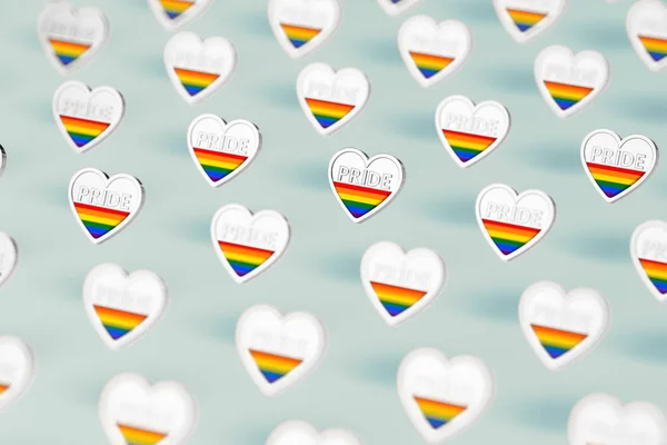 Silver heart with rainbow and word PRIDE inside. Month of pride concept ...