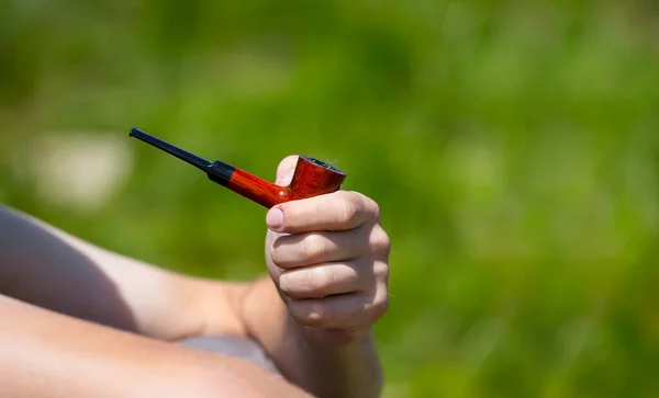 Human Hold Smoking Pipe Hand Coils Smoke Stock Photo by ©york_76 310347176