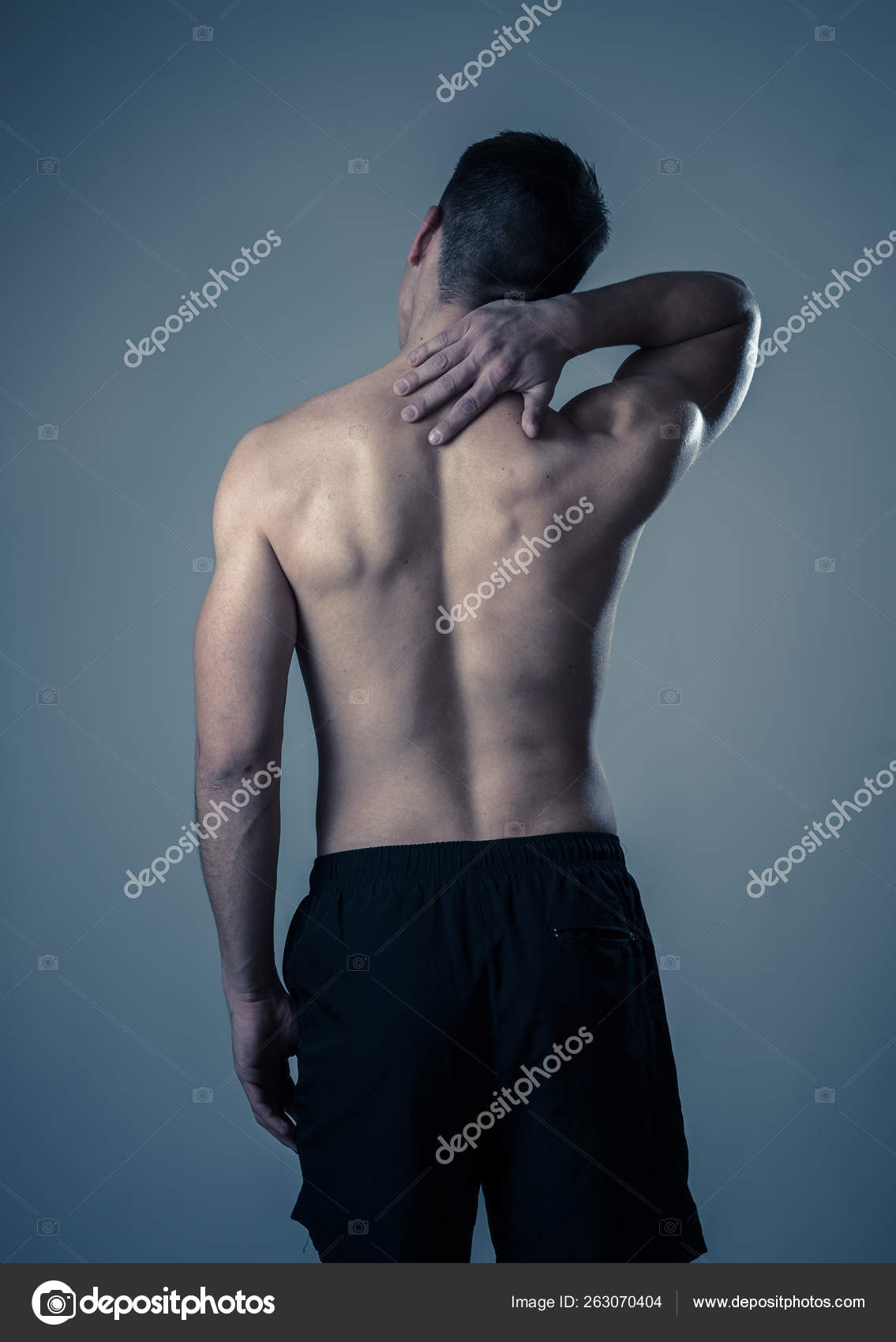 Young Muscular Fit Man Touching Grabbing Neck Upper Back Suffering ...
