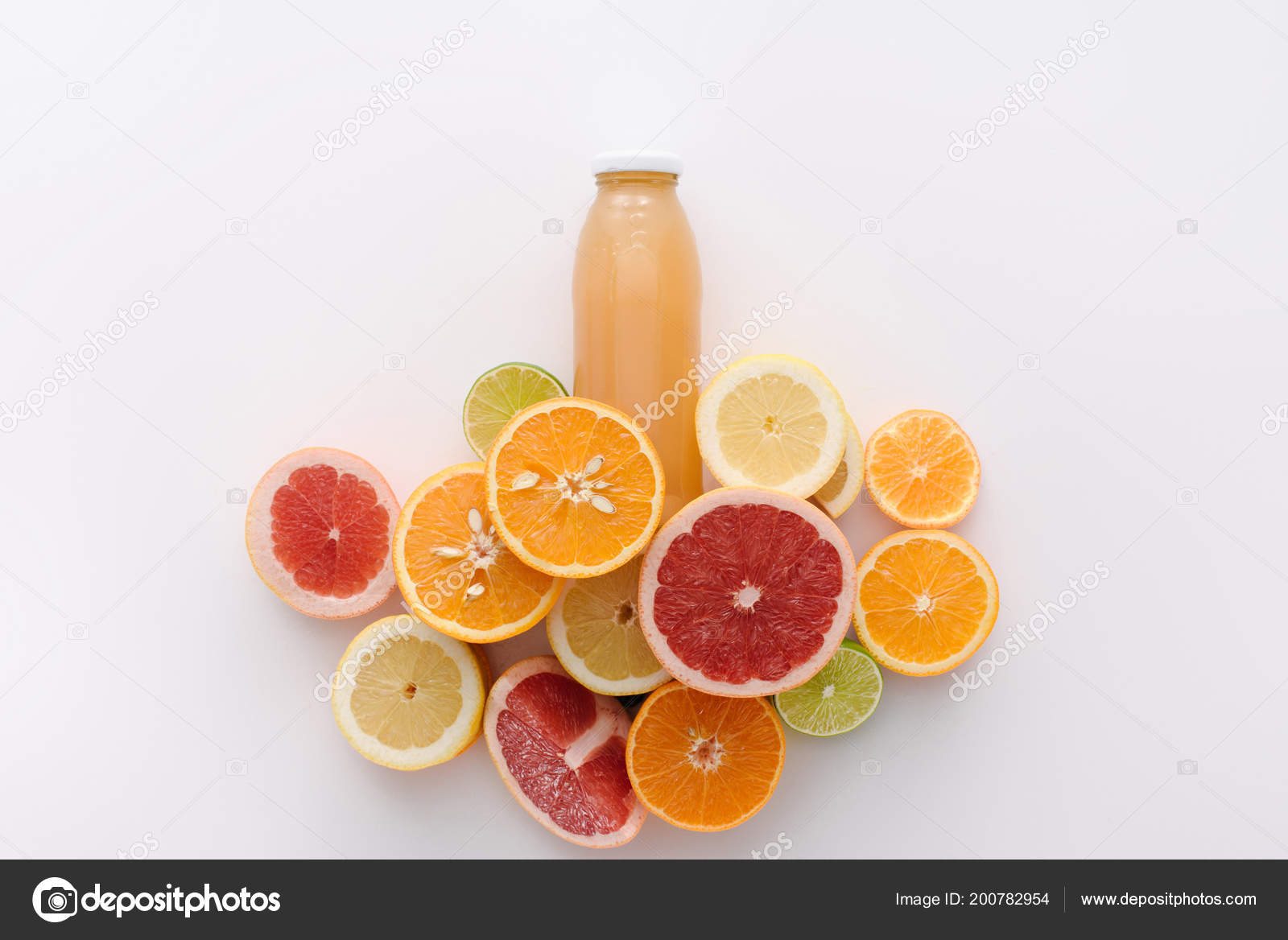Top View Bottle Juice Citrus Fruits Slices White Surface Stock Photo by ...