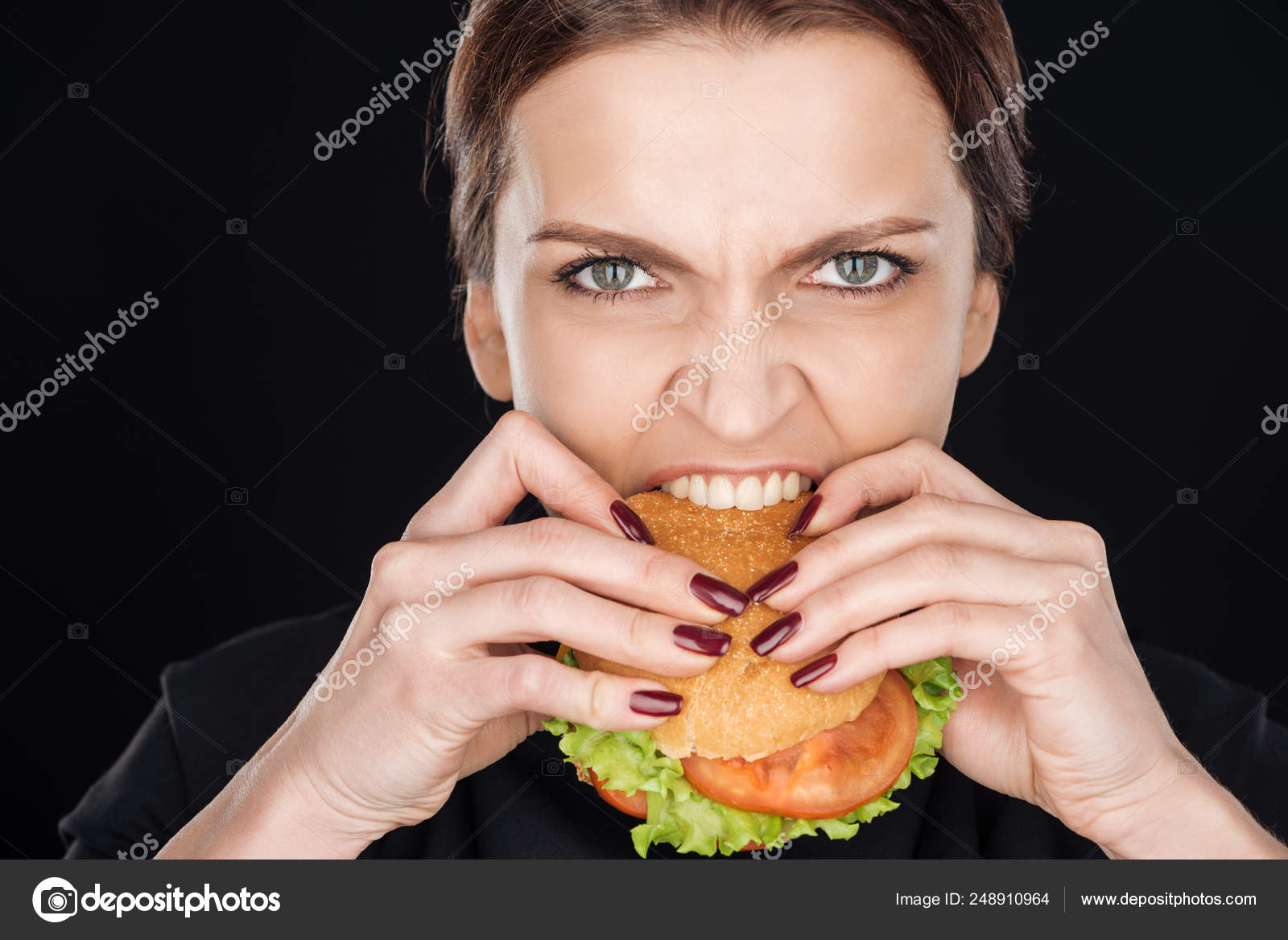 Angry Woman Eating Tasty Chicken Burger While Looking Camera Isolated ...