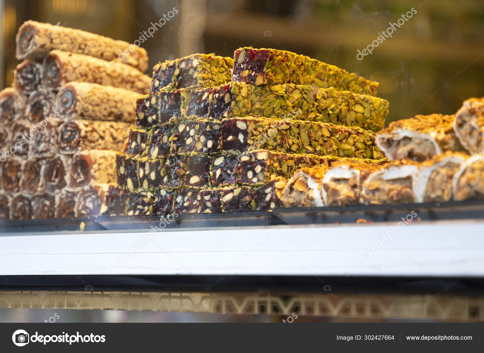 Traditional delicious turkish desserts in the shop window showcase ...
