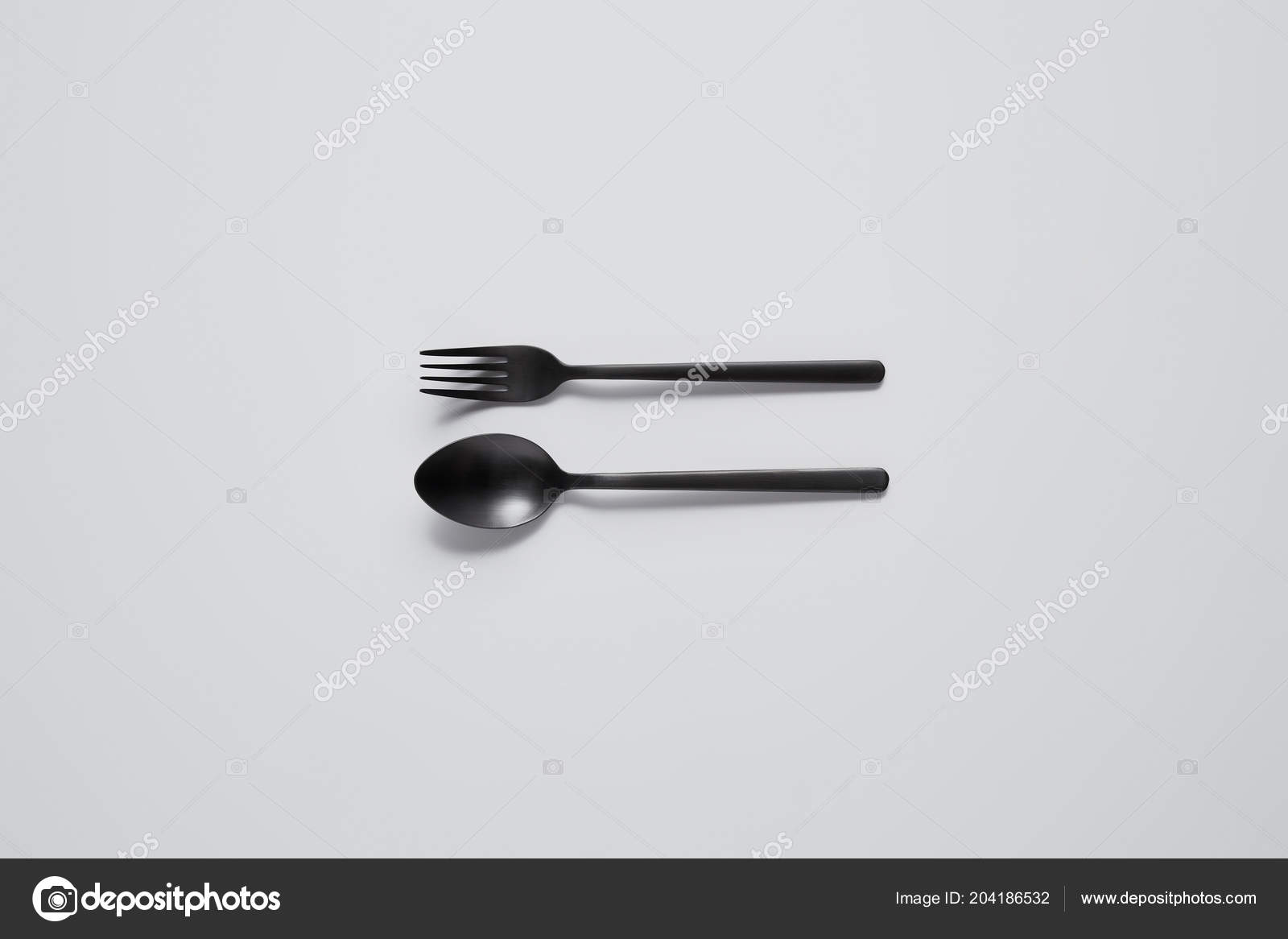 Top View Black Spoon Fork White Table Minimalistic Concept Stock Photo ...