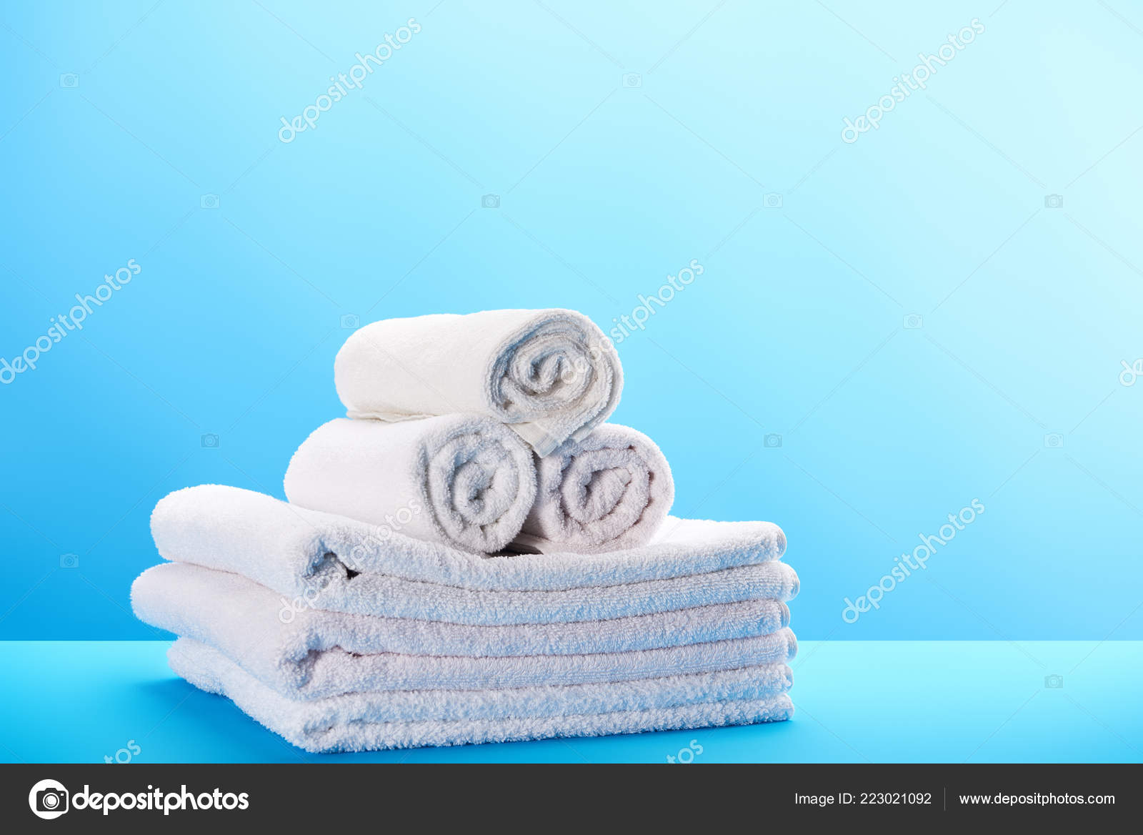 Rolled Stacked Clean White Towels Blue Stock Photo by ©AntonMatyukha ...