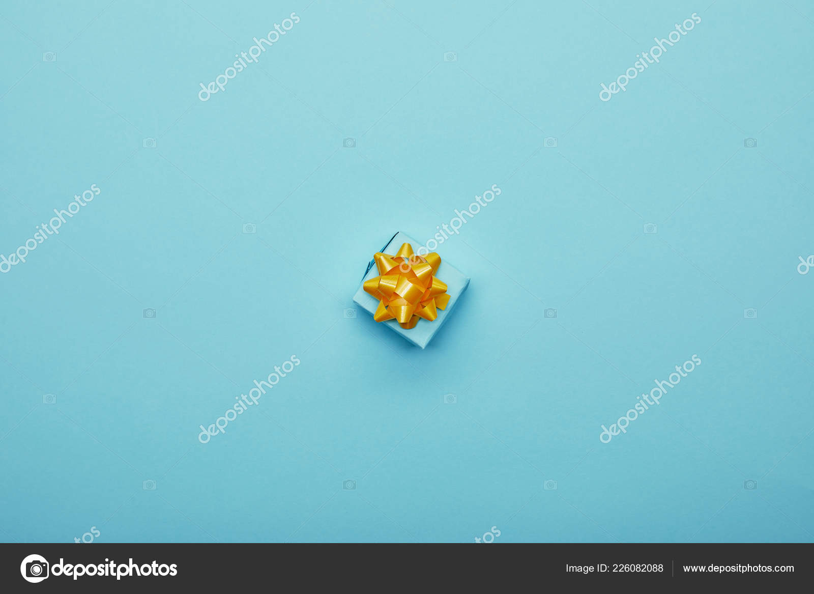 Top View Bright Gift Box Golden Bow Blue Background — Stock Photo ...