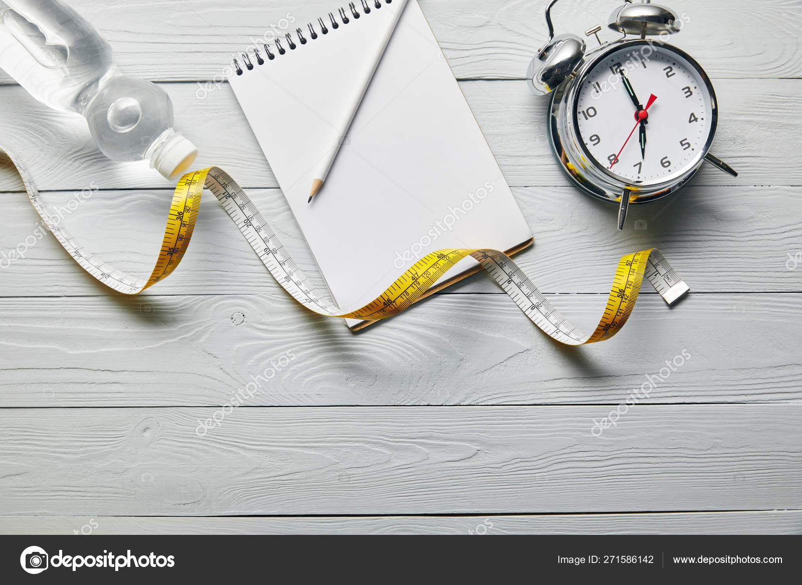 Top View Measuring Tape Blank Notebook Water Alarm Clock Wooden Stock ...