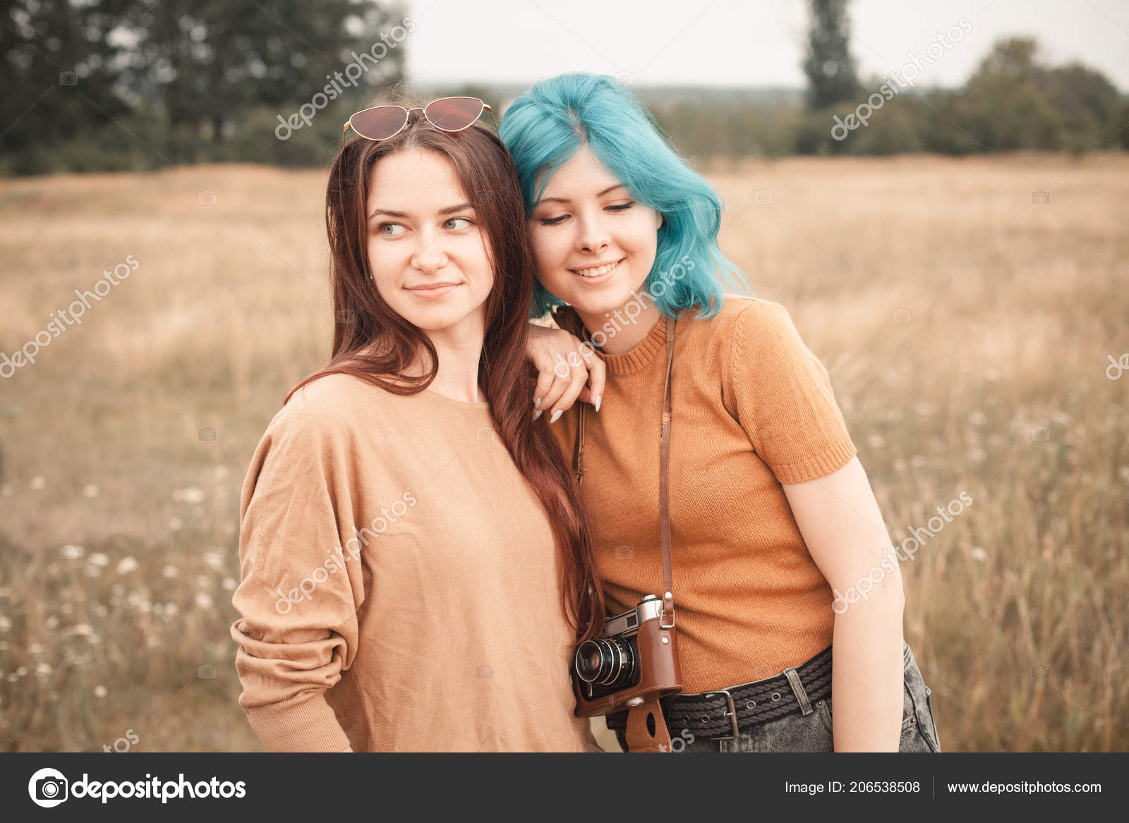 Two Young Smiling Friends Hugging Field Stock Photo by ©Dima_Aslanian ...